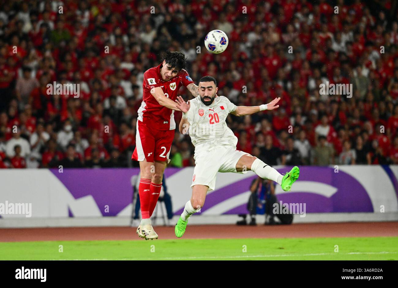 Jakarta, Indonesia. 25th Mar, 2025. Kevin Diks (L) of Indonesia vies ...
