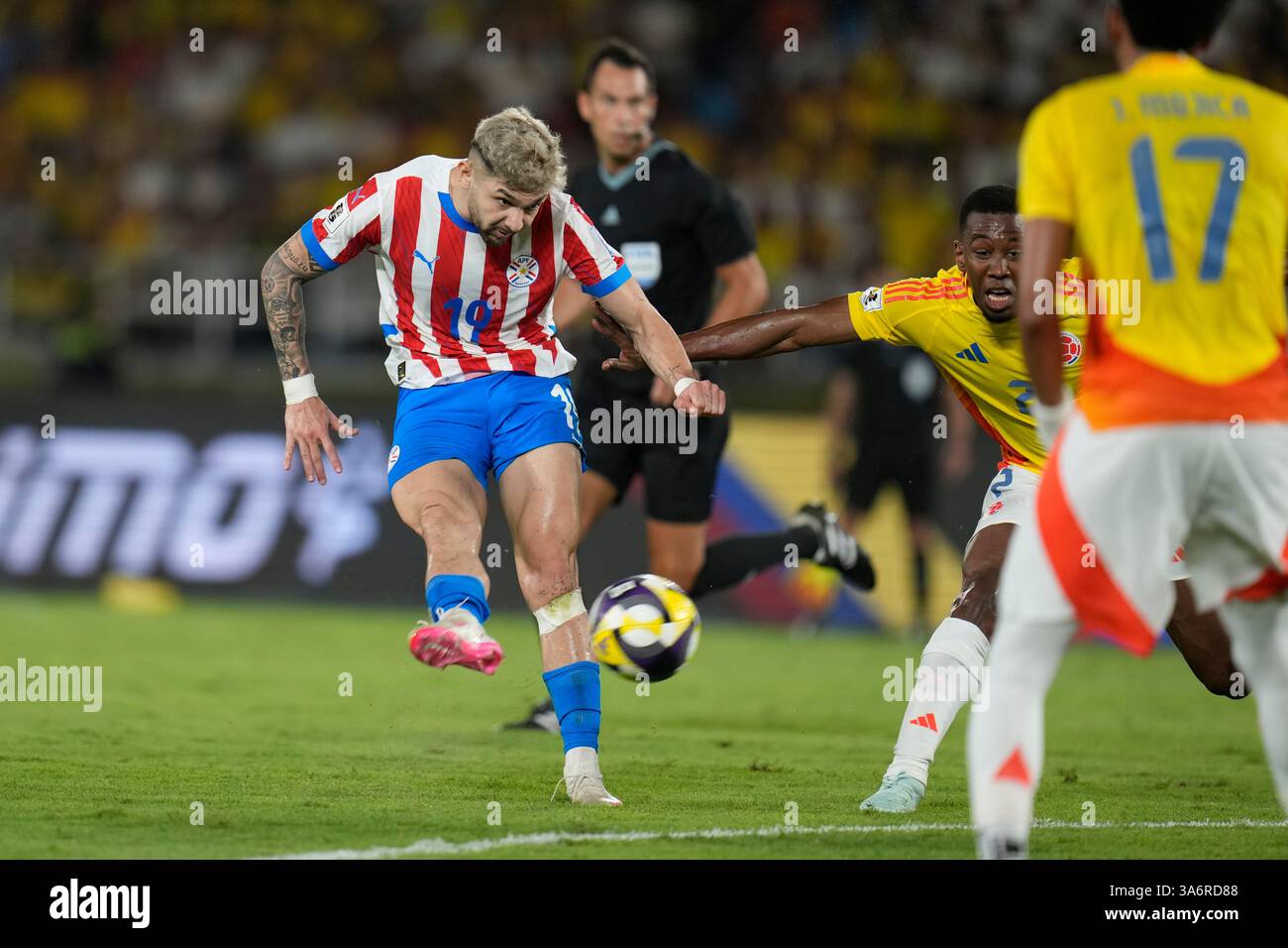 Paraguay's Julio Enciso scores his side's second goal against Colombia ...