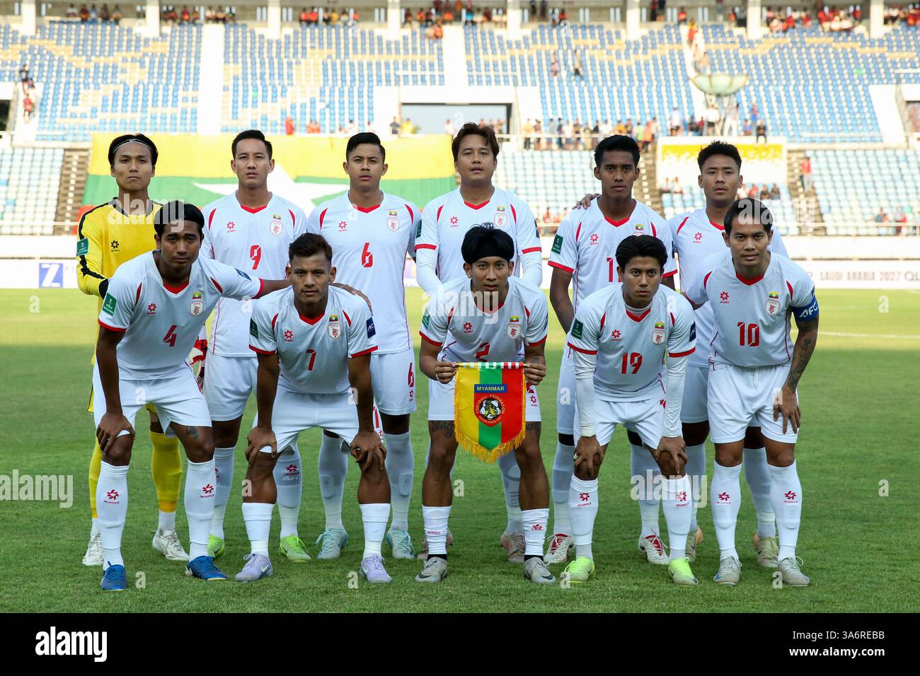 Yangon, Myanmar. 25th Mar, 2025. Players of Myanmar line up before the AFC Asian Cup 2027 ...