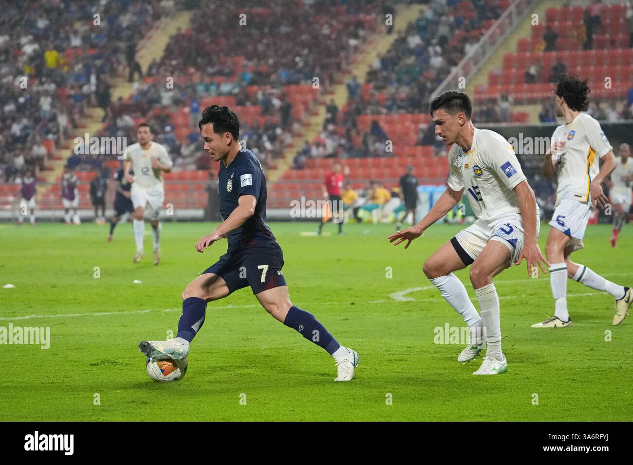 AIRFAN DOLOH #2 of Thailand(blue), control the ball during the AFC Asian Cup Saudi Arabia 2027 ...