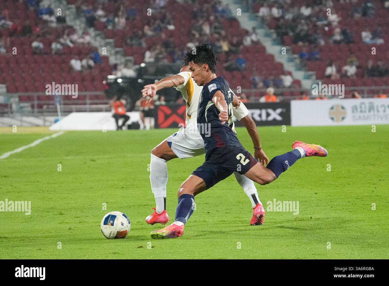 AIRFAN DOLOH #2 of Thailand(blue), control the ball during the AFC Asian Cup Saudi Arabia 2027 ...