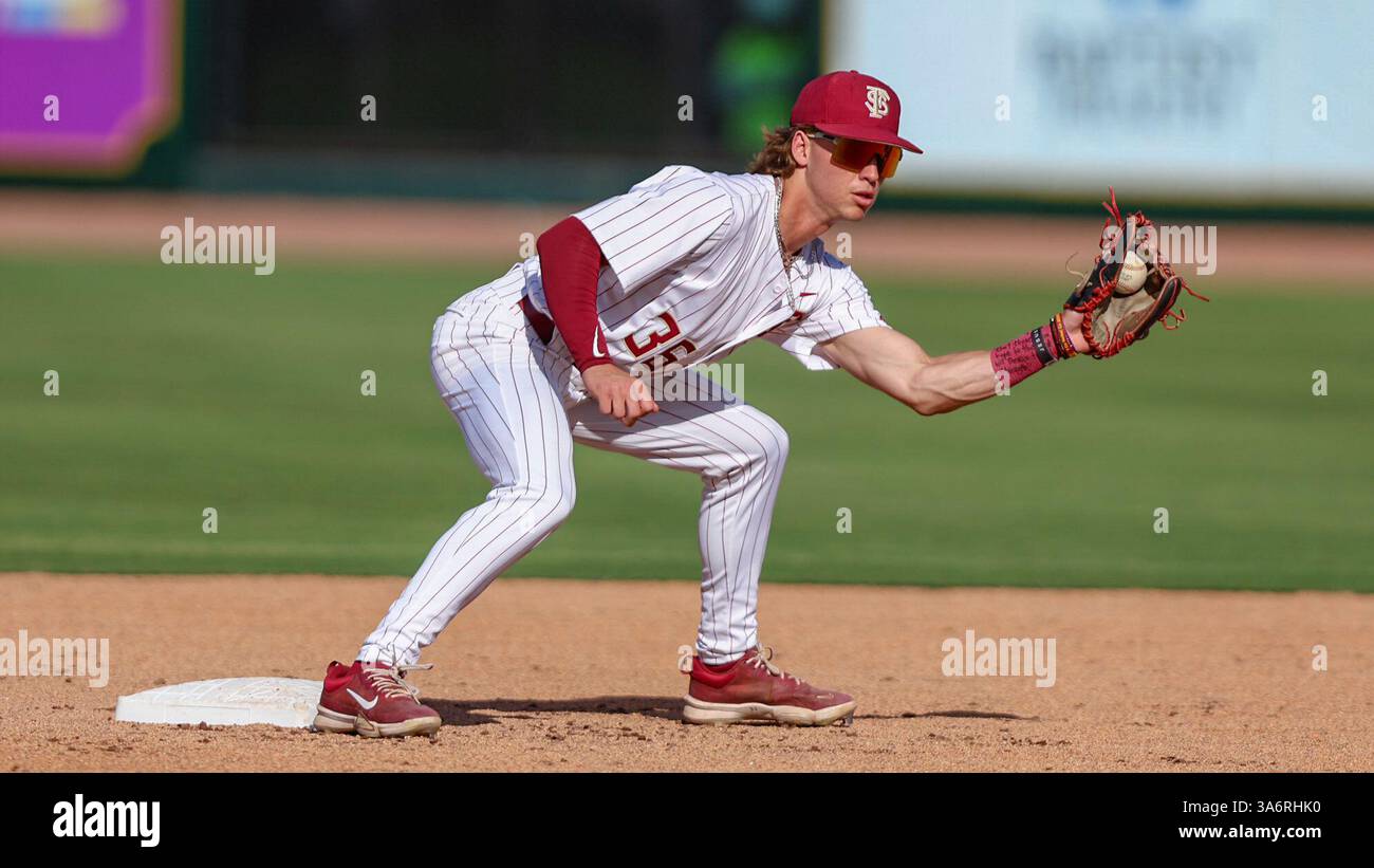 Florida State infielder Jace Estes (36) warms up before an NCAA ...
