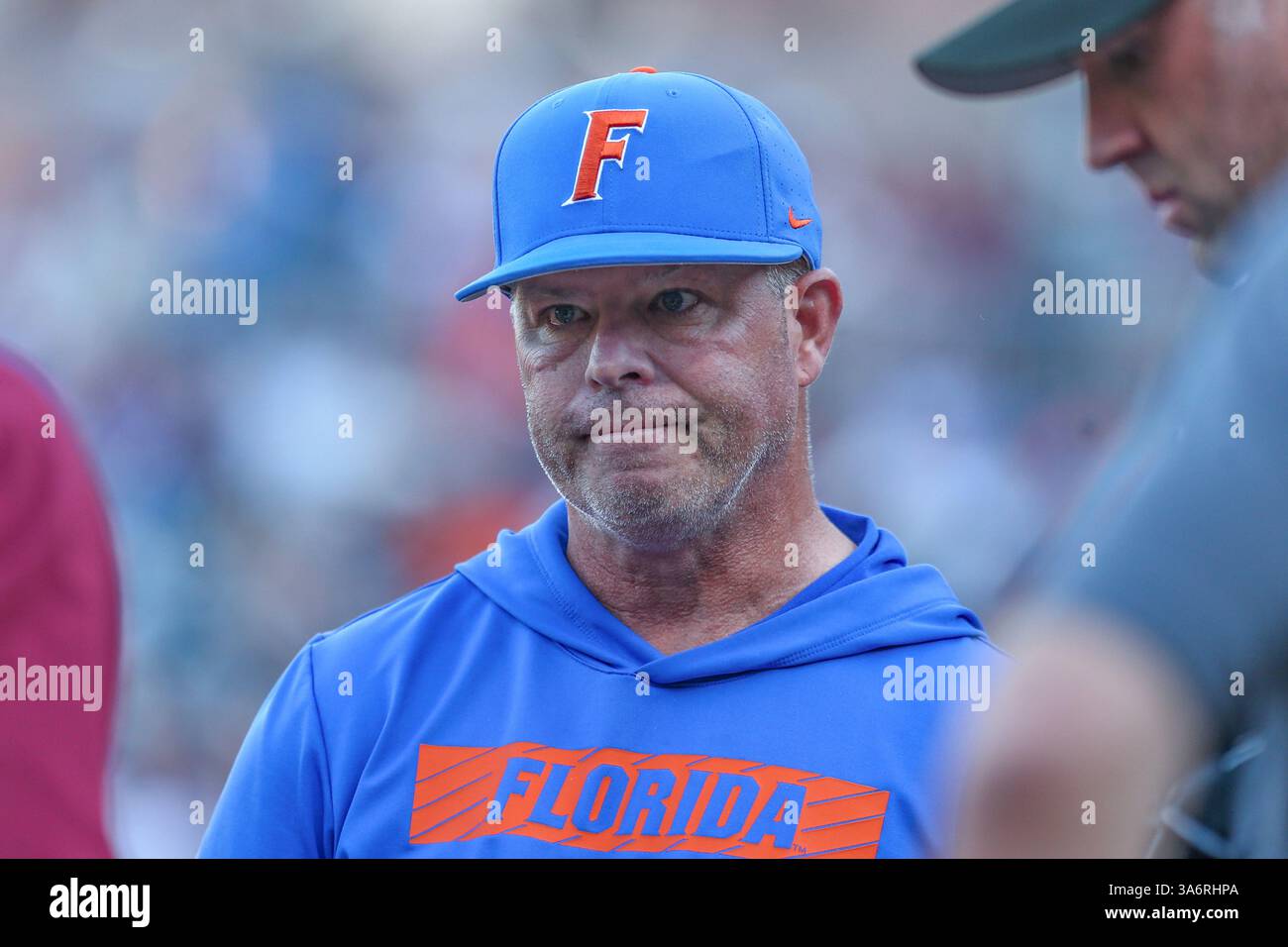 Florida head coach Kevin O'Sullivan meets with officials before an NCAA ...