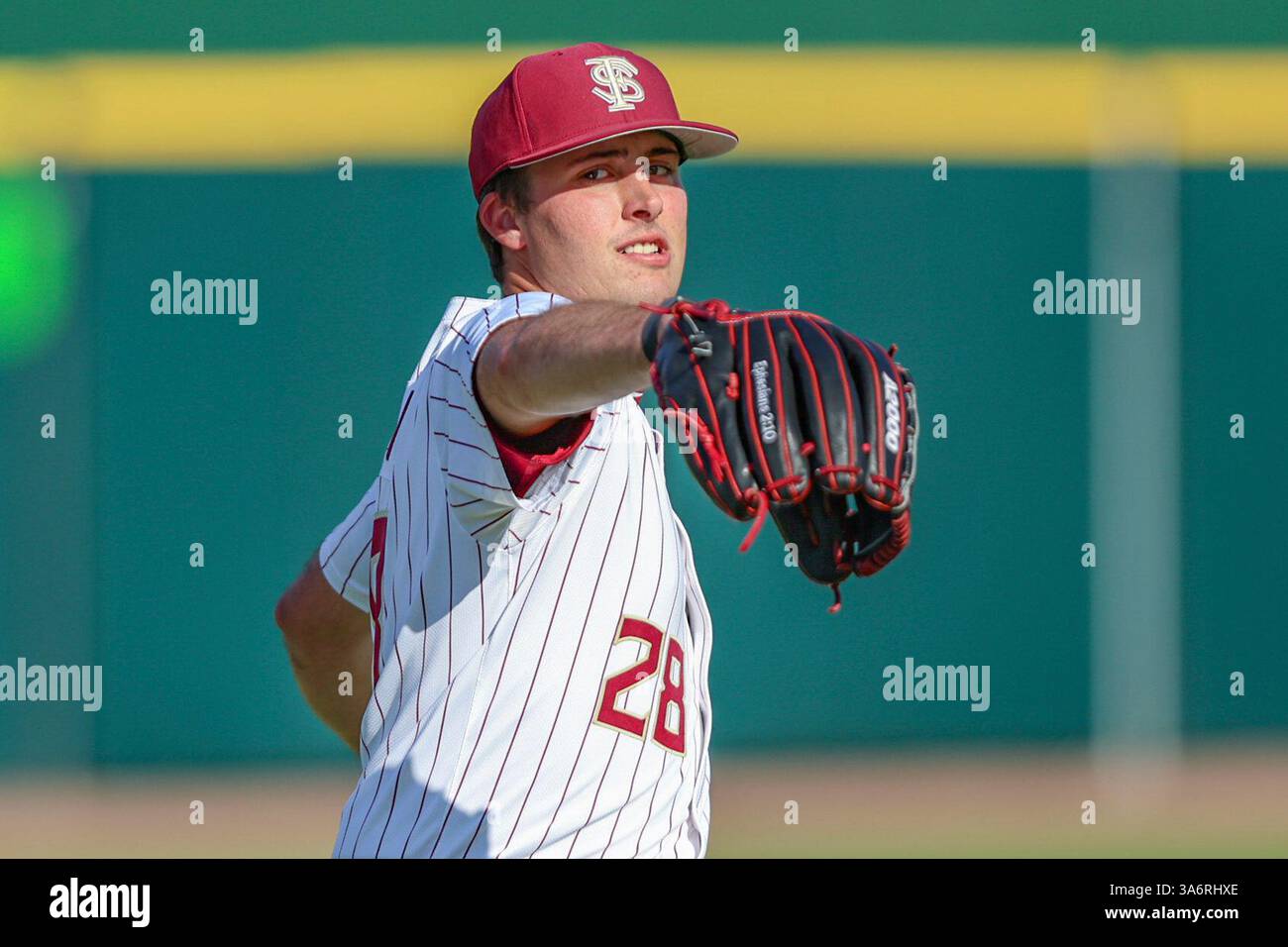Florida State pitcher Jacob Marlowe (28) warms up before an NCAA ...