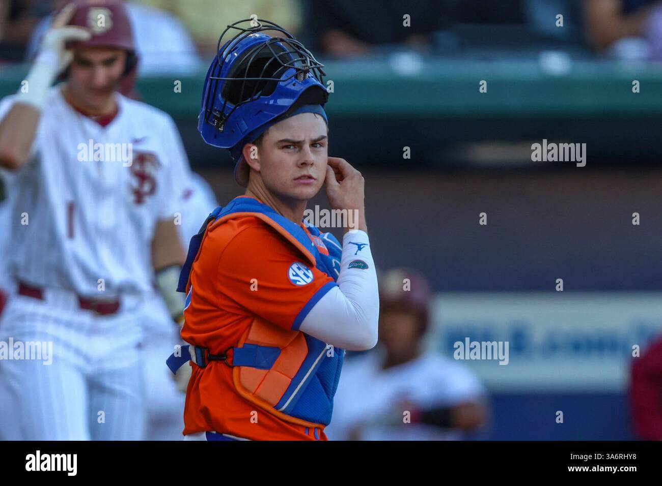 Florida catcher Luke Heyman (28) looks to his bench during an NCAA ...