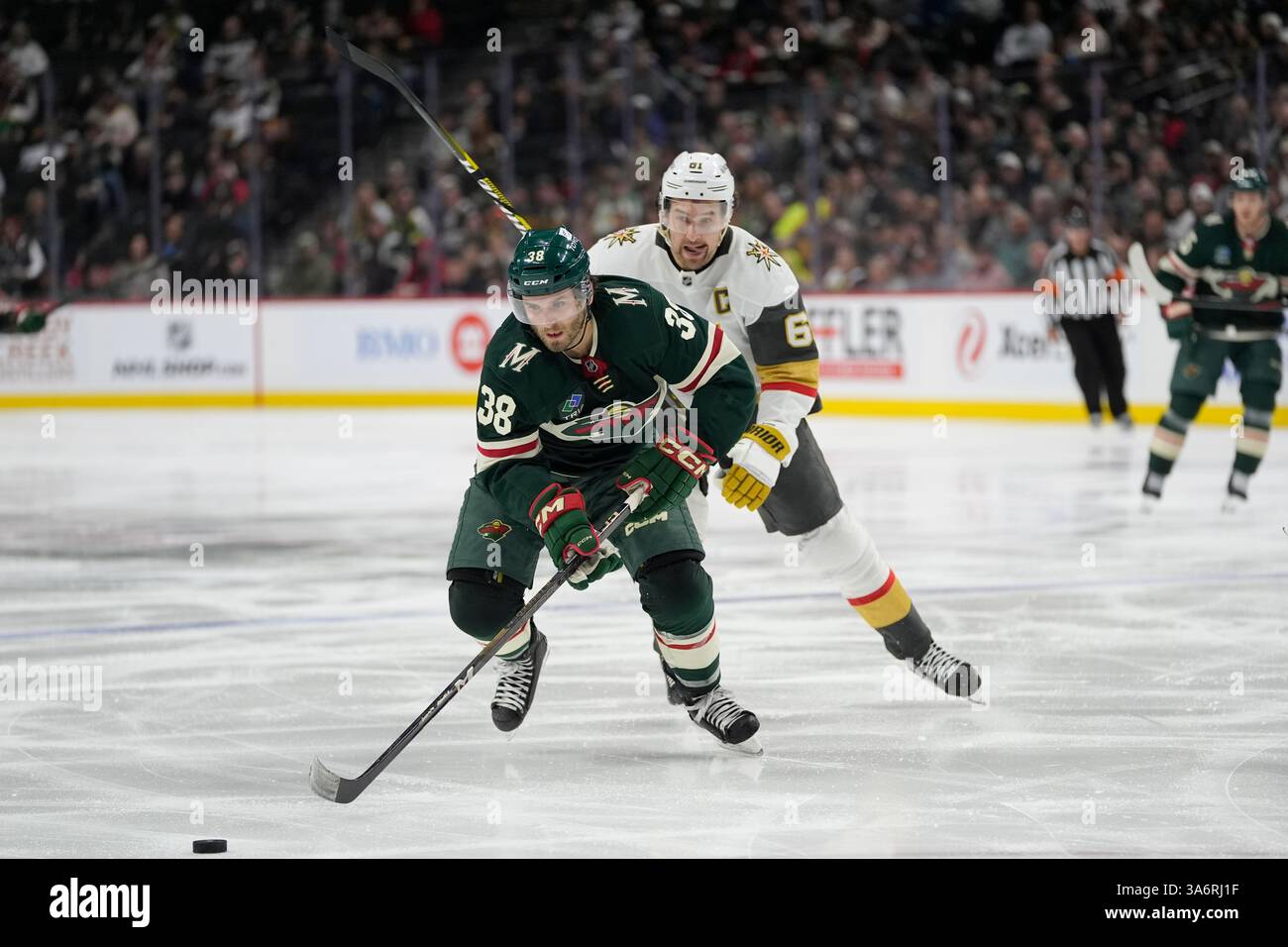 Minnesota Wild right wing Ryan Hartman (38) skates toward the puck as ...