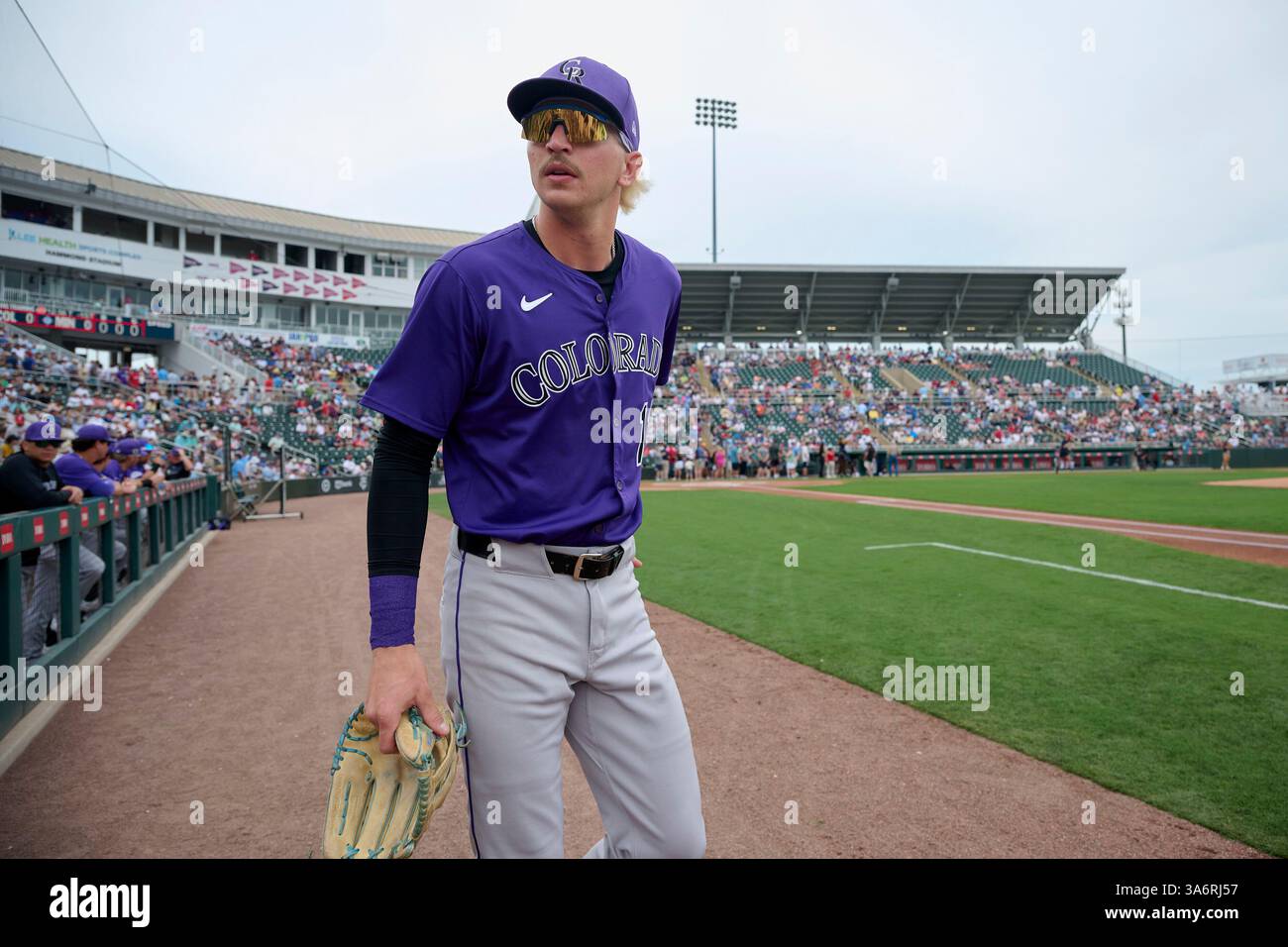 Colorado Rockies outfielder Zac Veen (13) takes the field for pre-game ...