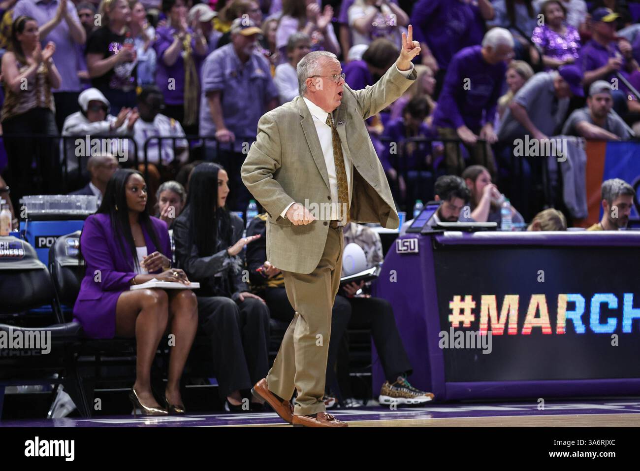 March 24, 2025: LSU Associate Head Coach Bob Starkey calls in a play ...
