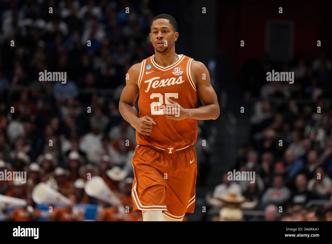 Texas forward Jayson Kent (25) looks on during a First Four college ...
