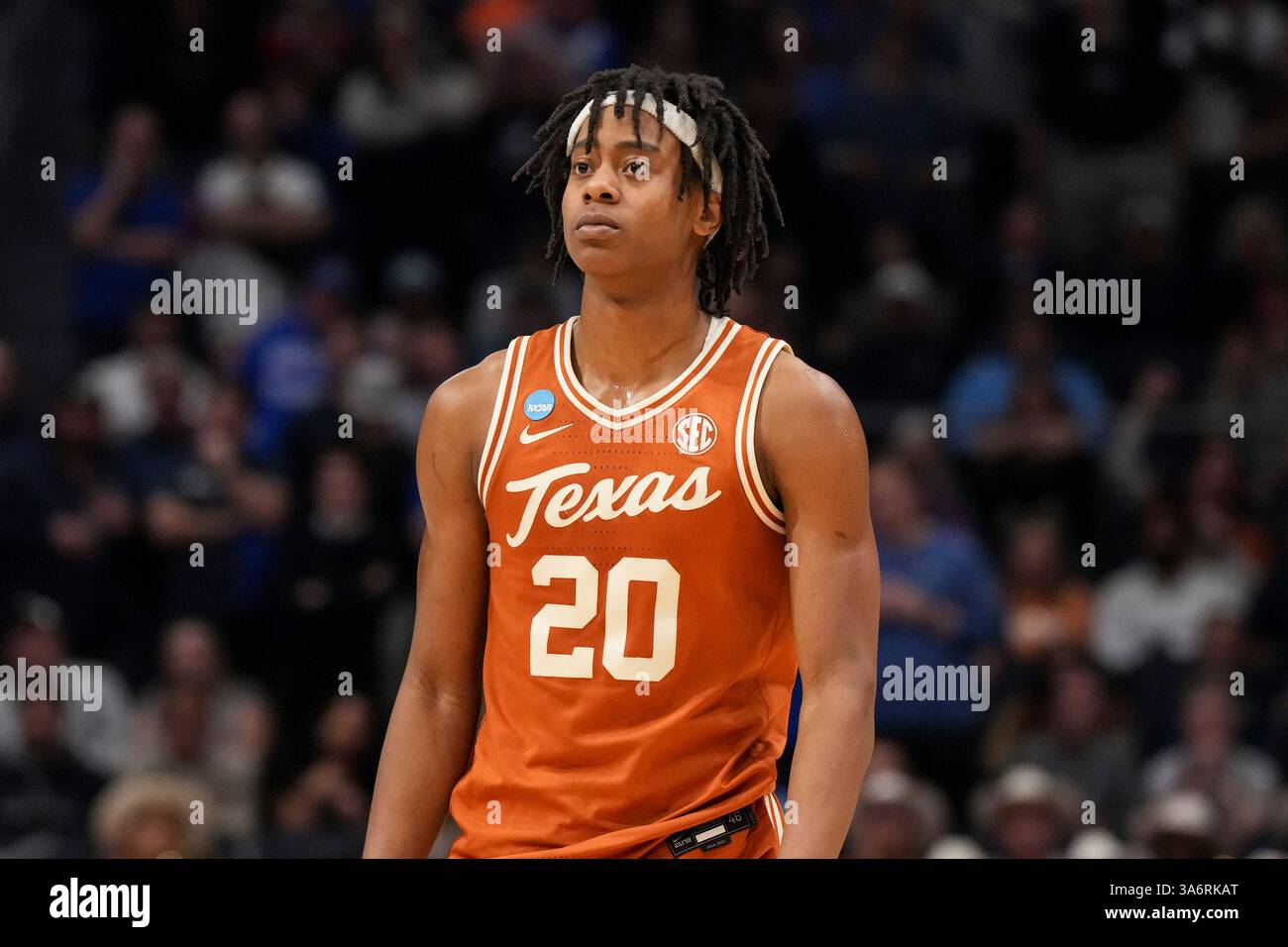 Texas guard Tre Johnson (20) looks on during a First Four college ...