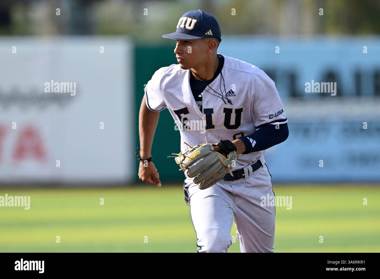 Florida International infielder Adonys Velez (8) follows a play during ...