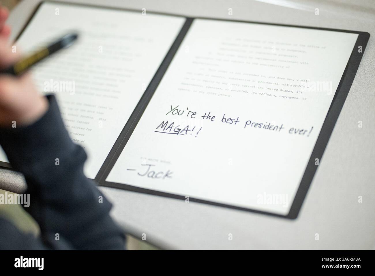 President Donald Trump signs an Executive Order to dismantle the ...
