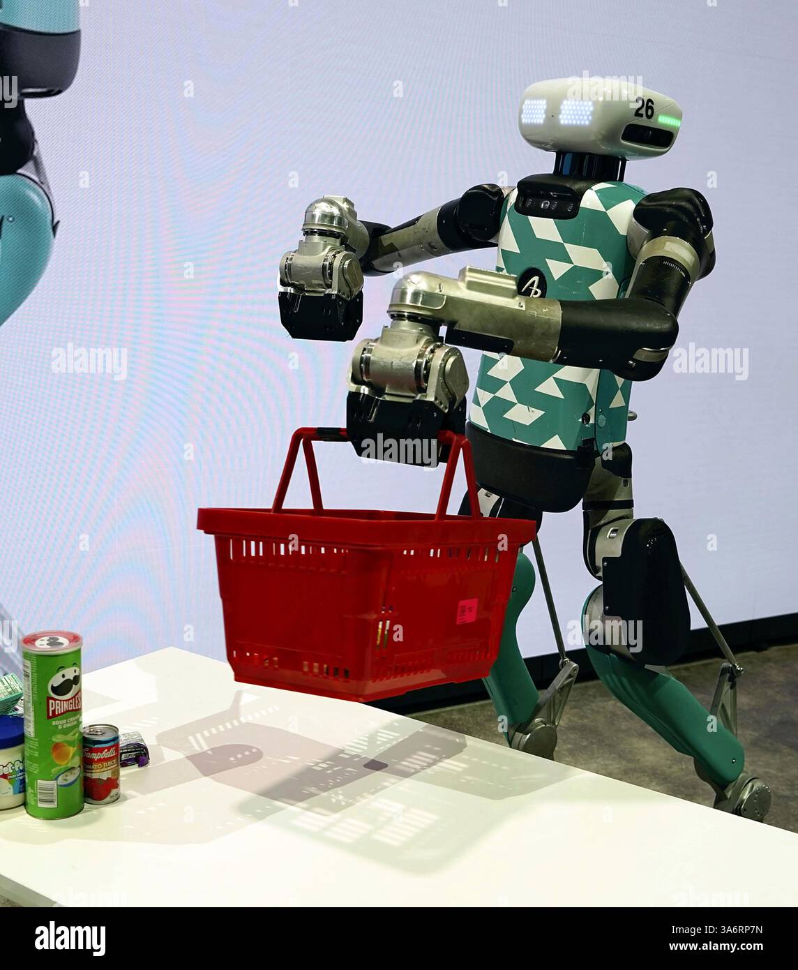 A photo shows an Agility Robotics robot carrying a shopping cart is ...