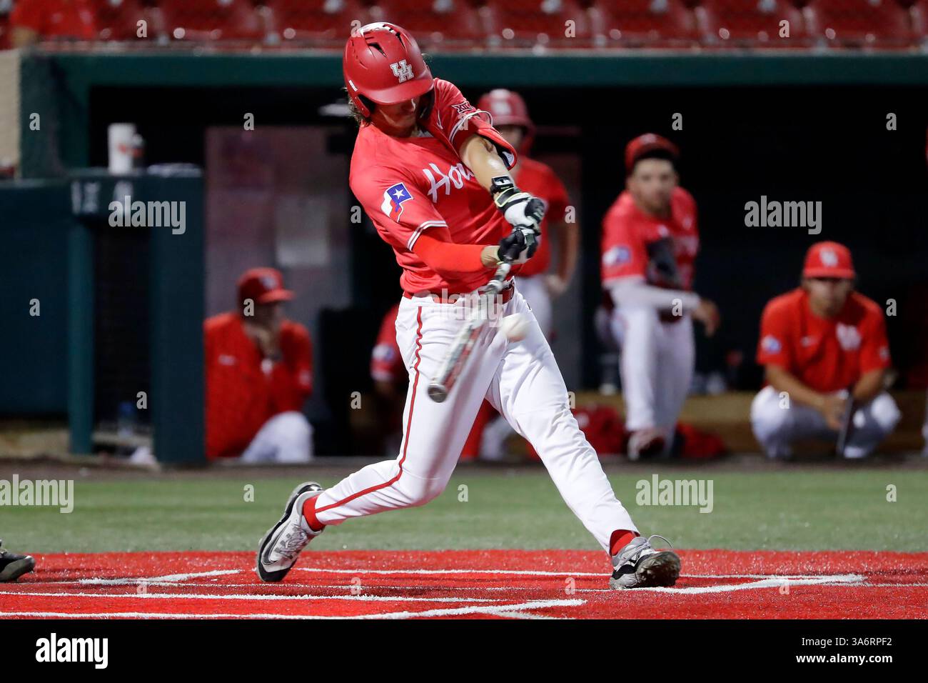 Houston's Tyler Cox connects for his two-run RBI double against Stephen ...