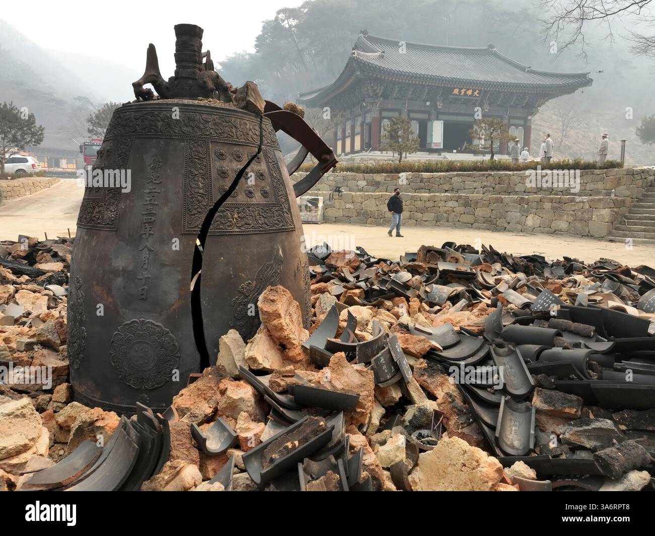 A bell is seen broken at the remains of the bell pavilion at Goun ...