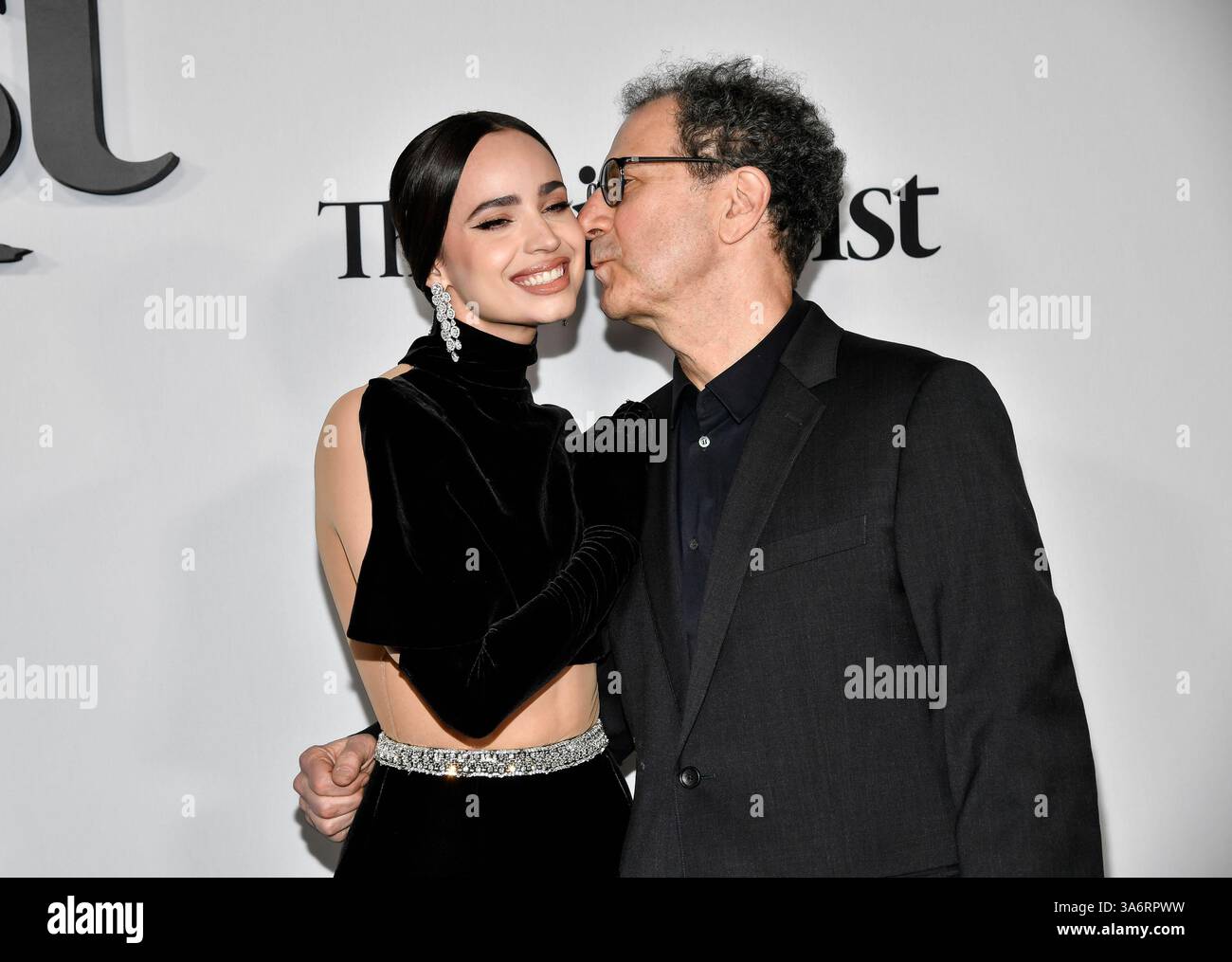 Sofia Carson, left, and Adam Brooks attend the premiere of Netflix's ...
