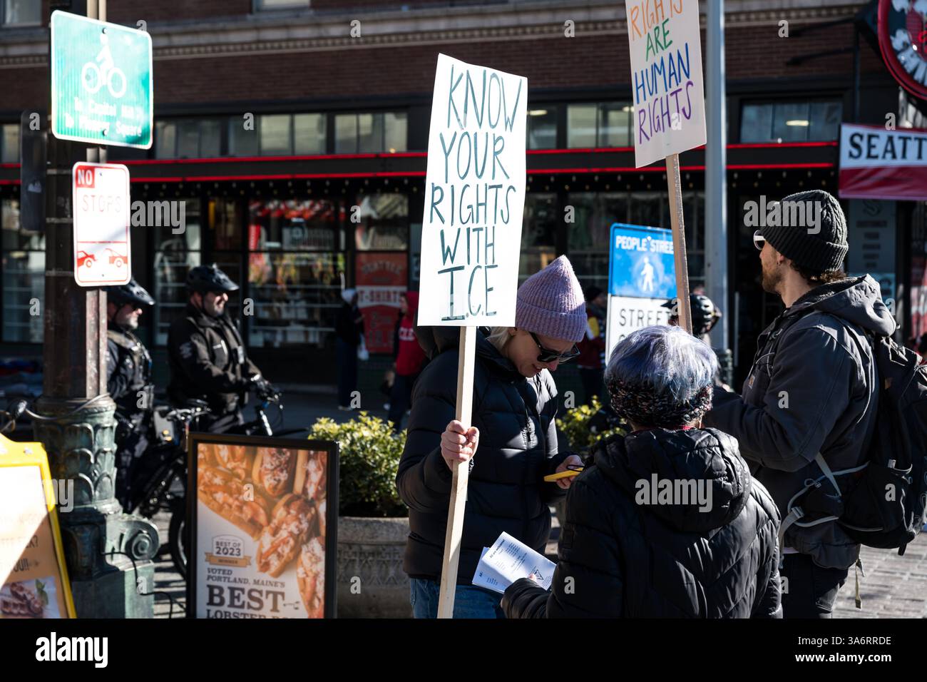 Seattle, USA. 26th Jan 2025. Pro immigration and trans rights folks at ...