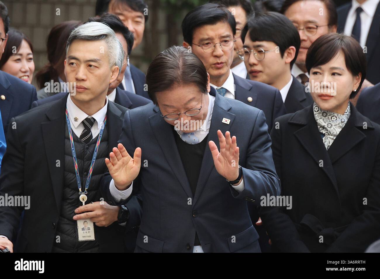 Lee Jae-myung, center, leader of South Korea's main opposition Democratic Party, arrives at a ...