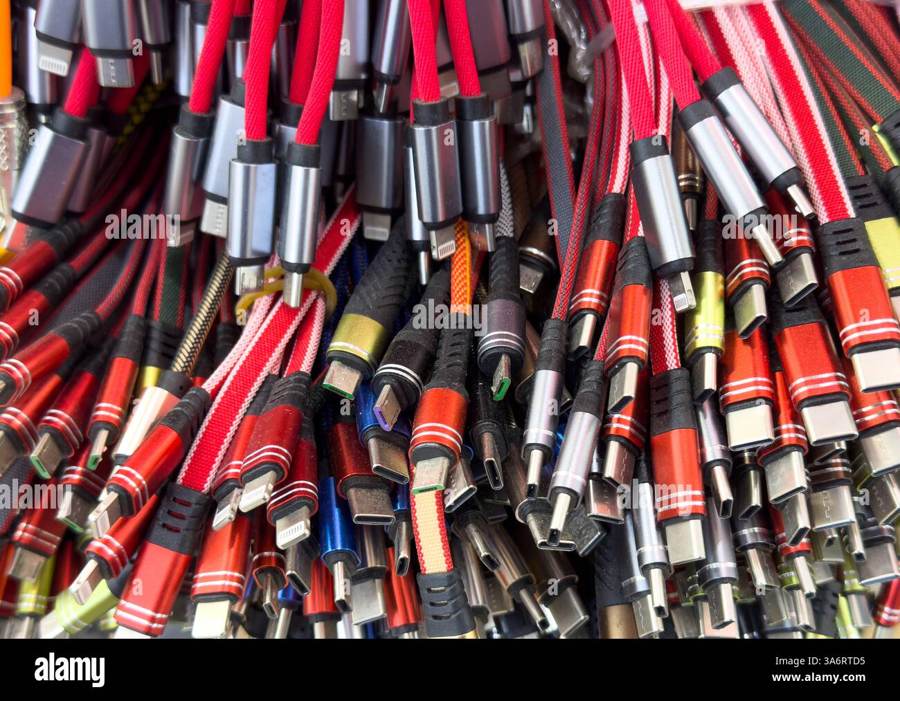 Different types of charger connectors for phones texture background ...