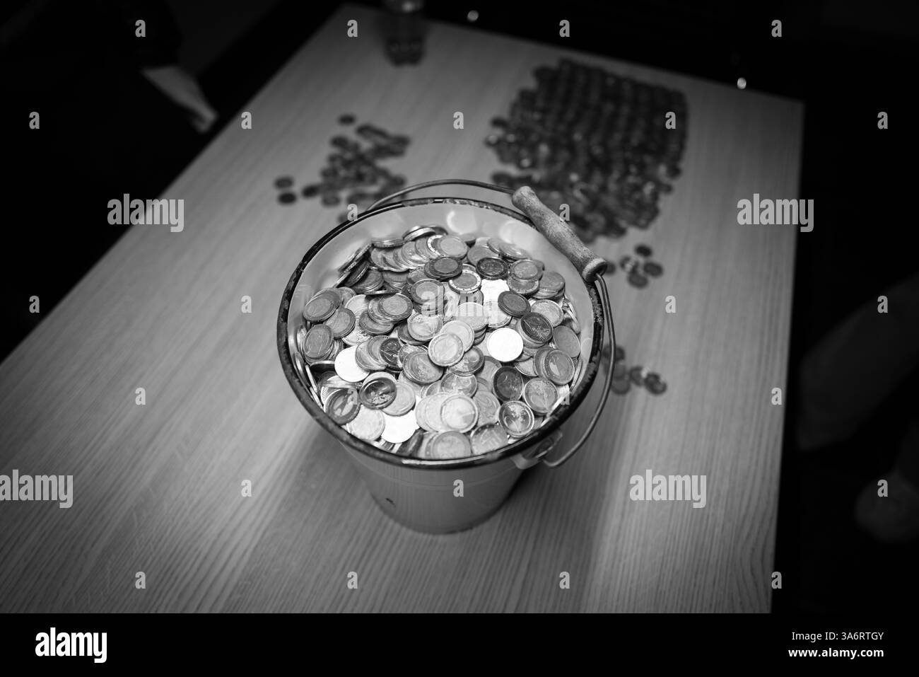 Coin bucket Black and White Stock Photos & Images - Alamy