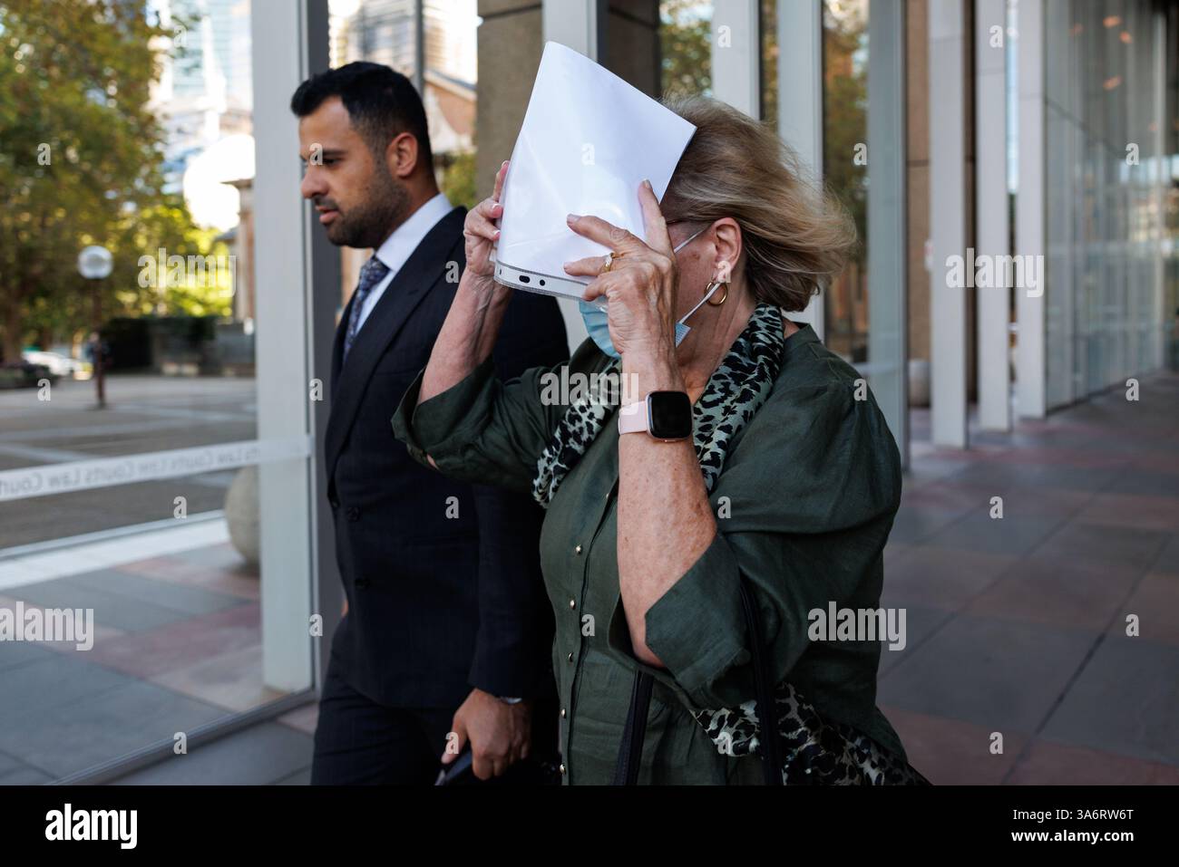 Sydney, Australia. 26th Mar, 2025. Helga Lam (right) leaves the Supreme ...