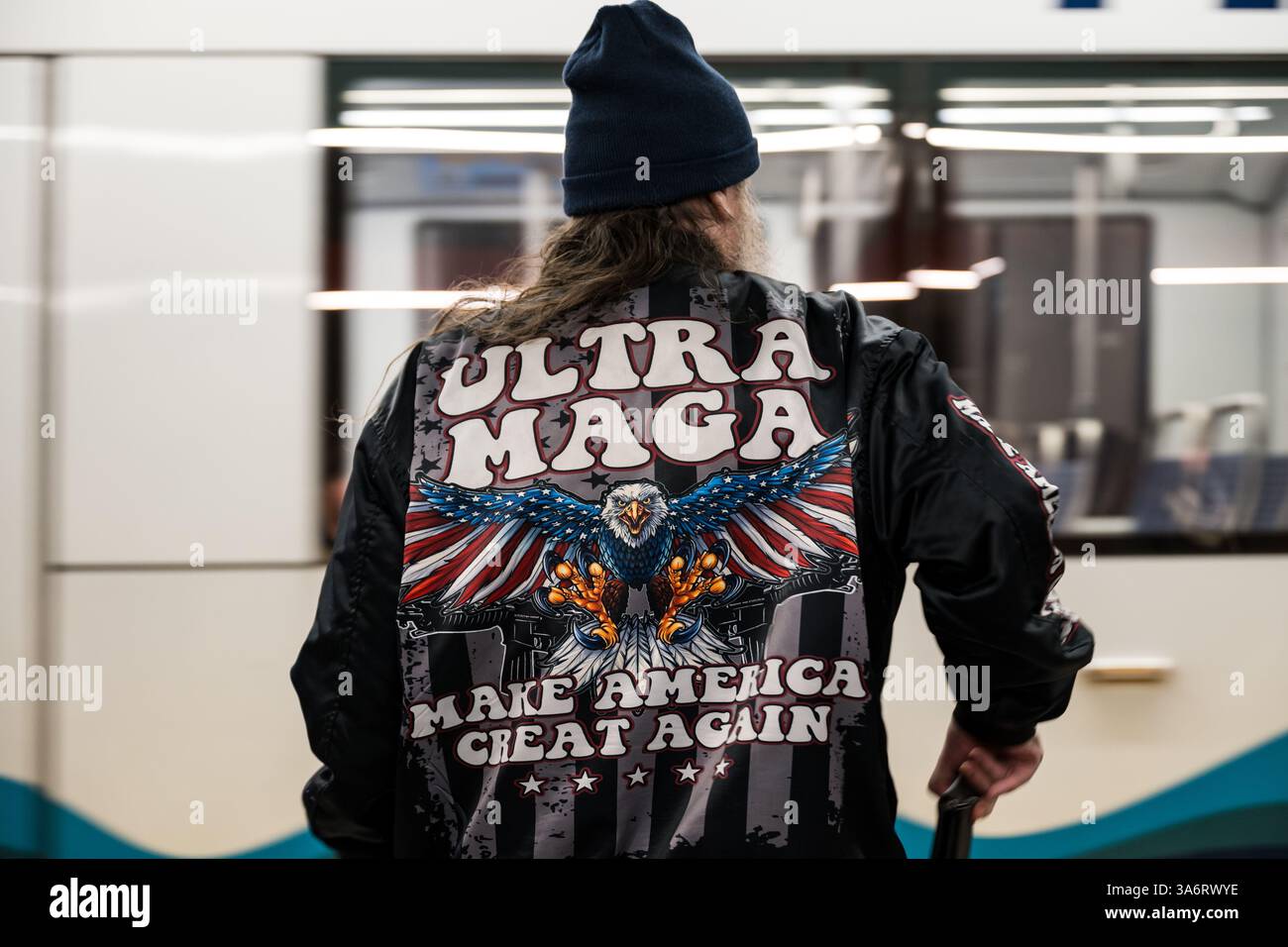 Seattle, USA. 18th Mar 2025. Person wearing an Ultra Maga jacket in ...