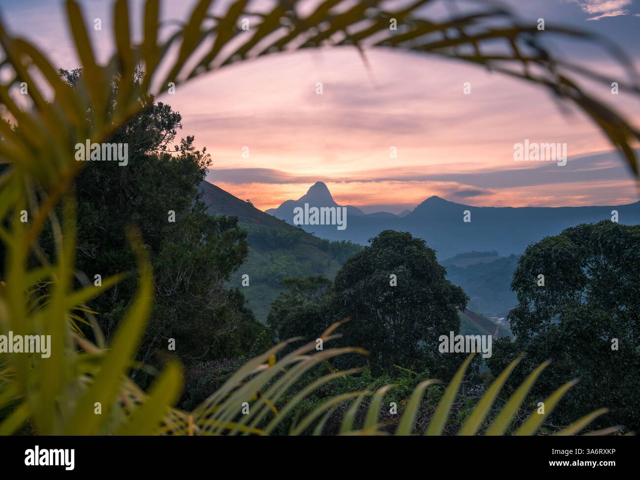 Sunset Over a Valley Framed by Tropical Foliage in Itaipava - Rio de ...