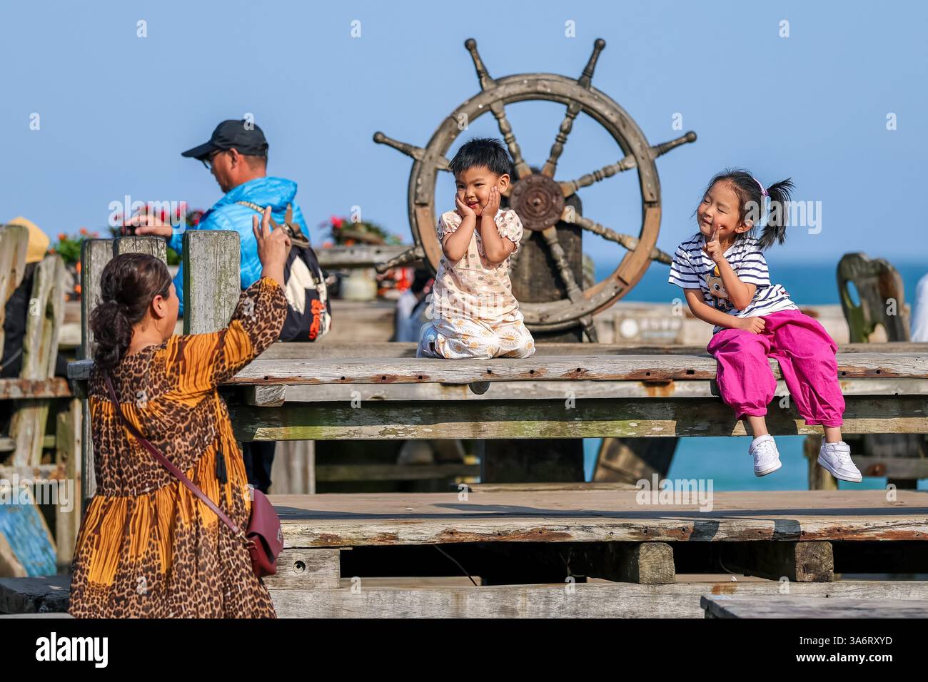**CHINESE MAINLAND, HONG KONG, MACAU AND TAIWAN OUT** Tourists enjoy ...