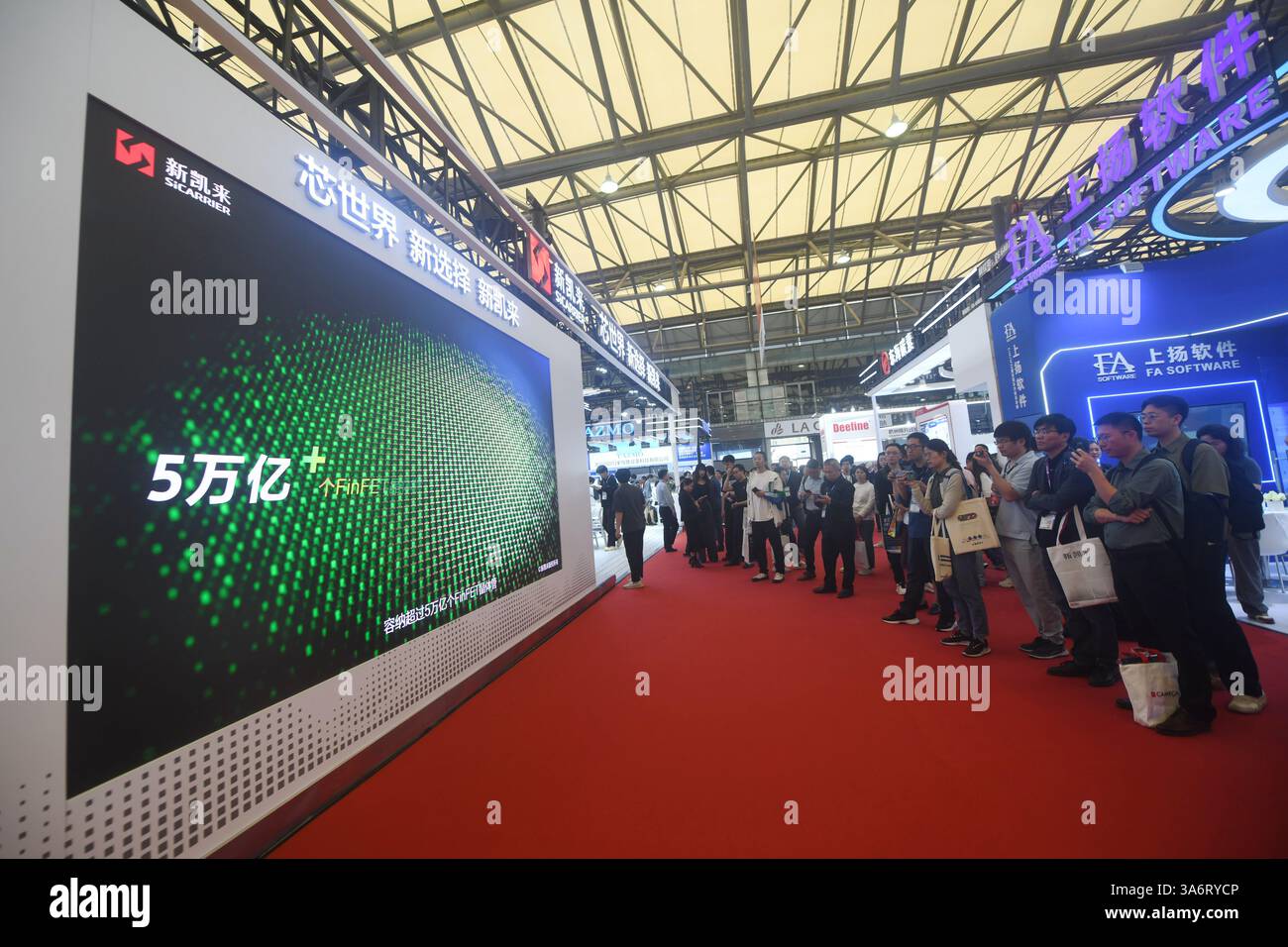 SHANGHAI, CHINA - MARCH 26, 2025 - Visitors visit SiCARRIER booth at ...