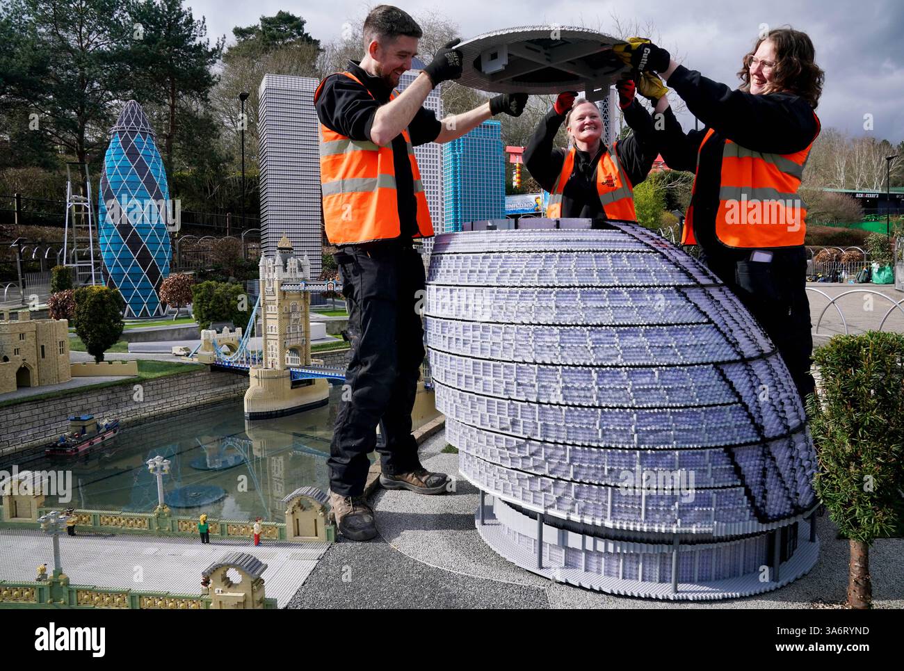 Model makers assemble a replica of Old City Hall, as part of their ...