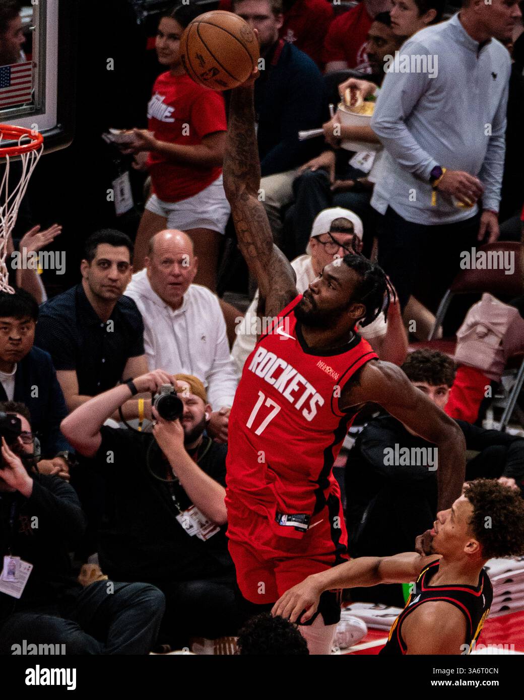 Houston, USA. 25th Mar, 2025. Tari Eason (L) of Houston Rockets dunks ...