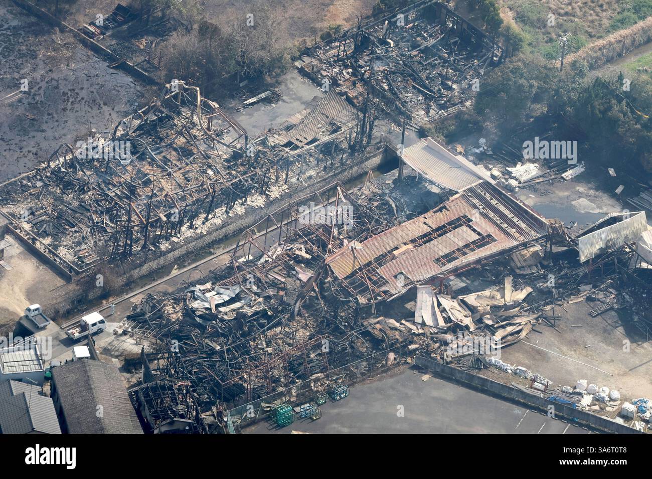 Aerial photo shows burnt houses due to forest fire in Imabari City ...