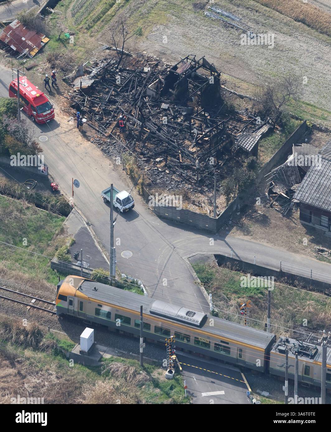 Aerial photo shows burnt houses due to forest fire in Imabari City ...