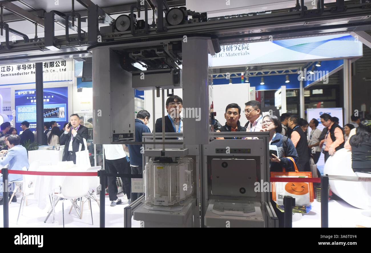 SHANGHAI, CHINA - MARCH 26, 2025 - Visitors watch the production line of integrated circuits at ...