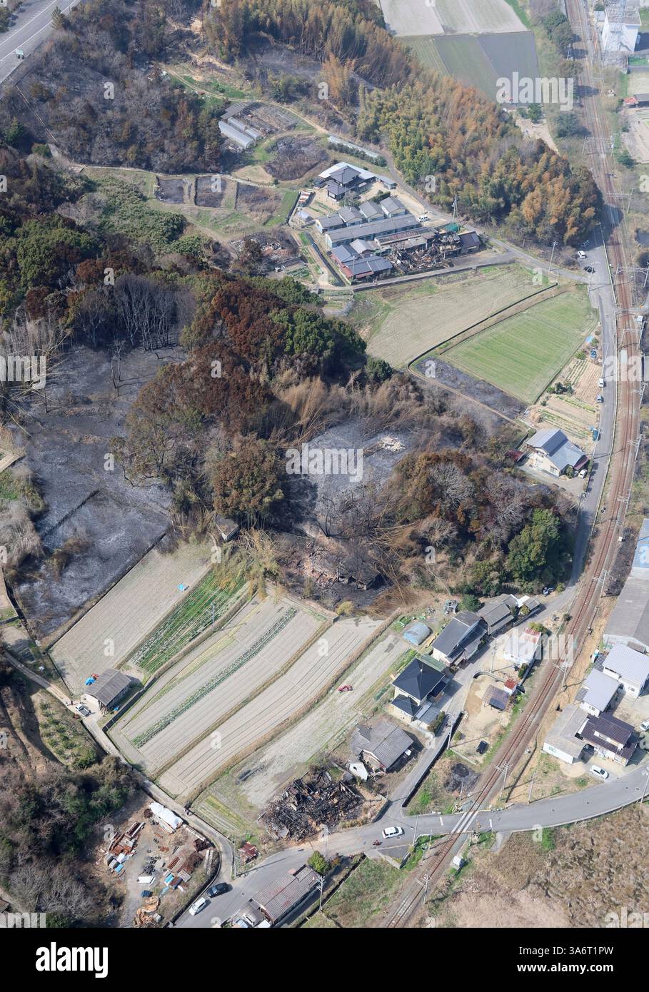 Aerial photo shows burnt Buildings and forests due to forest fire in ...