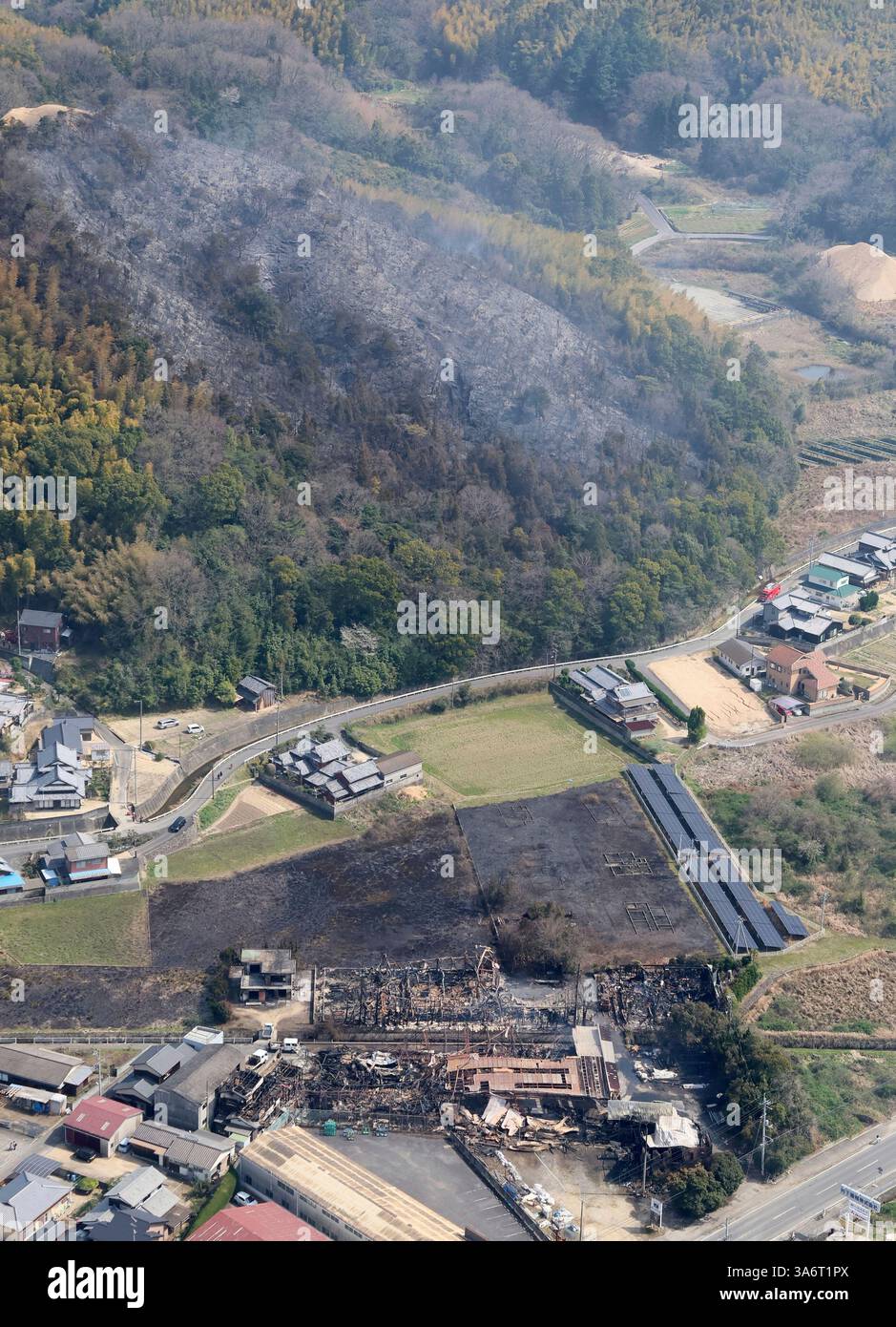 Aerial photo shows burnt Buildings and forests due to forest fire in ...
