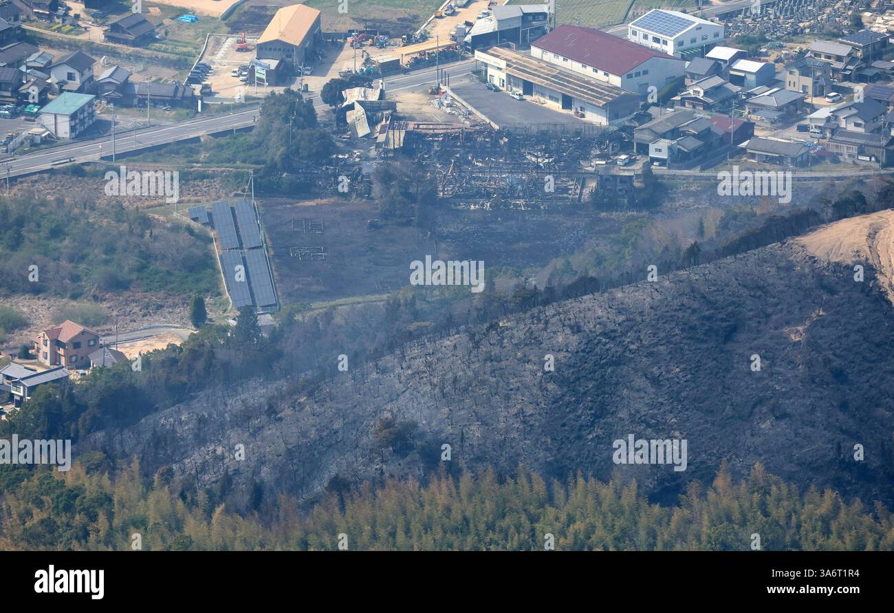 Aerial photo shows burnt Buildings and forests due to forest fire in ...