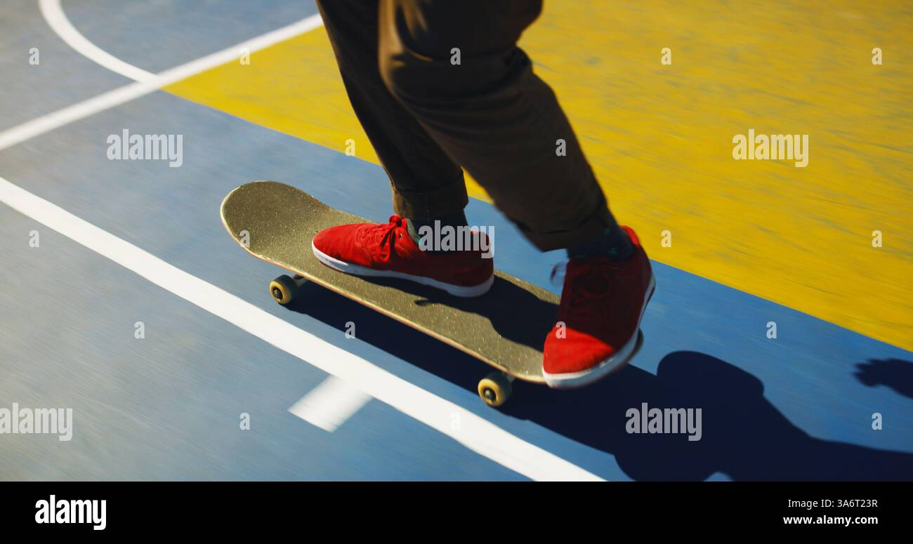 Skateboard, sneakers and person learning trick for outdoor hobby ...