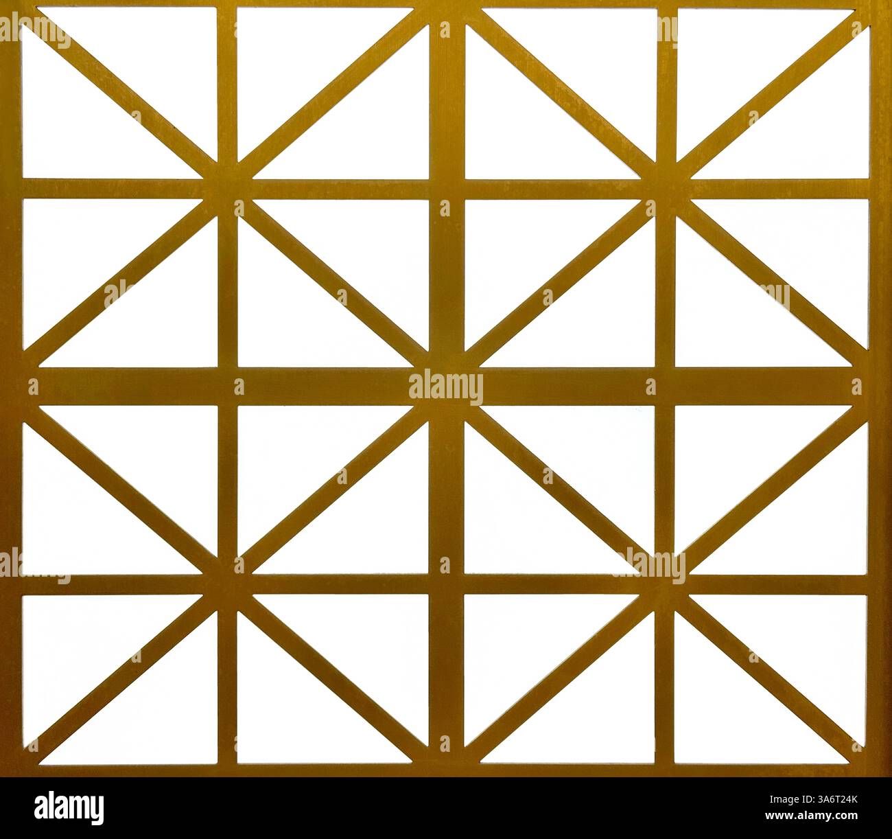 Close up of gold steel metallic laser cut pattern in geometric star ...