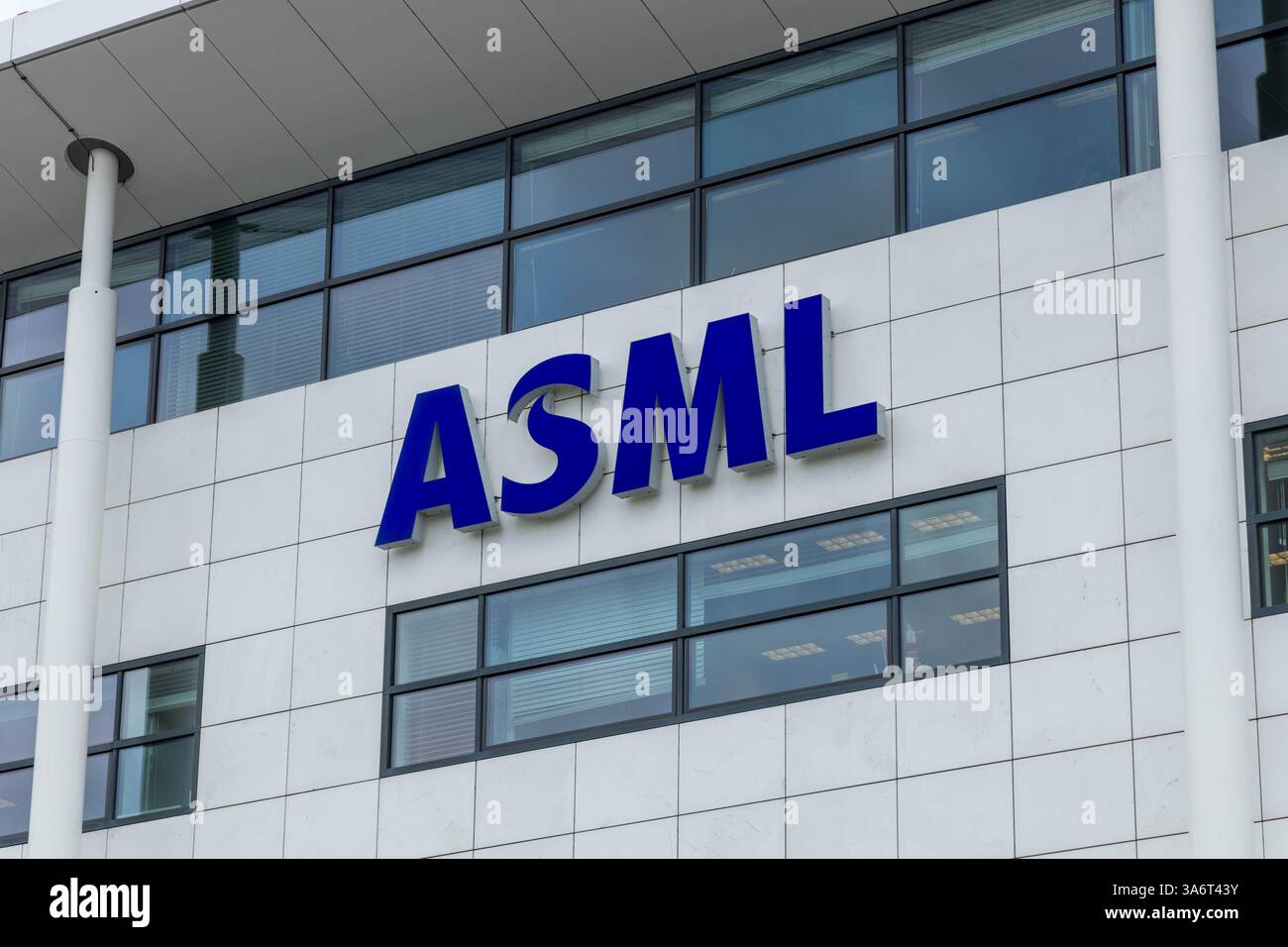 ASML logo with its building and the exterior facade. The Dutch company business is the world’s ...