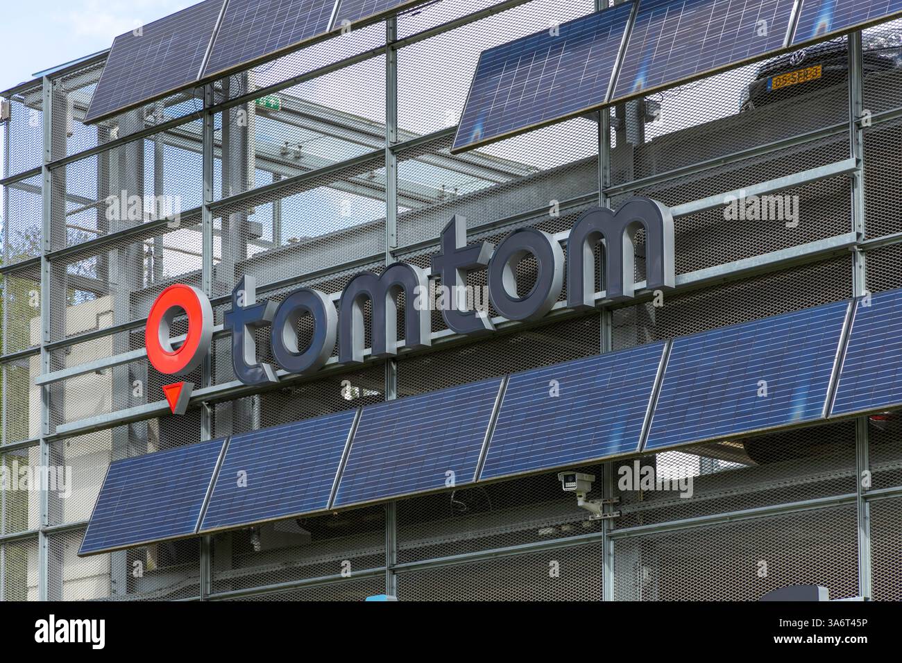 TomTom logo at the High tech campus Eindhoven. Surrounded with solar ...