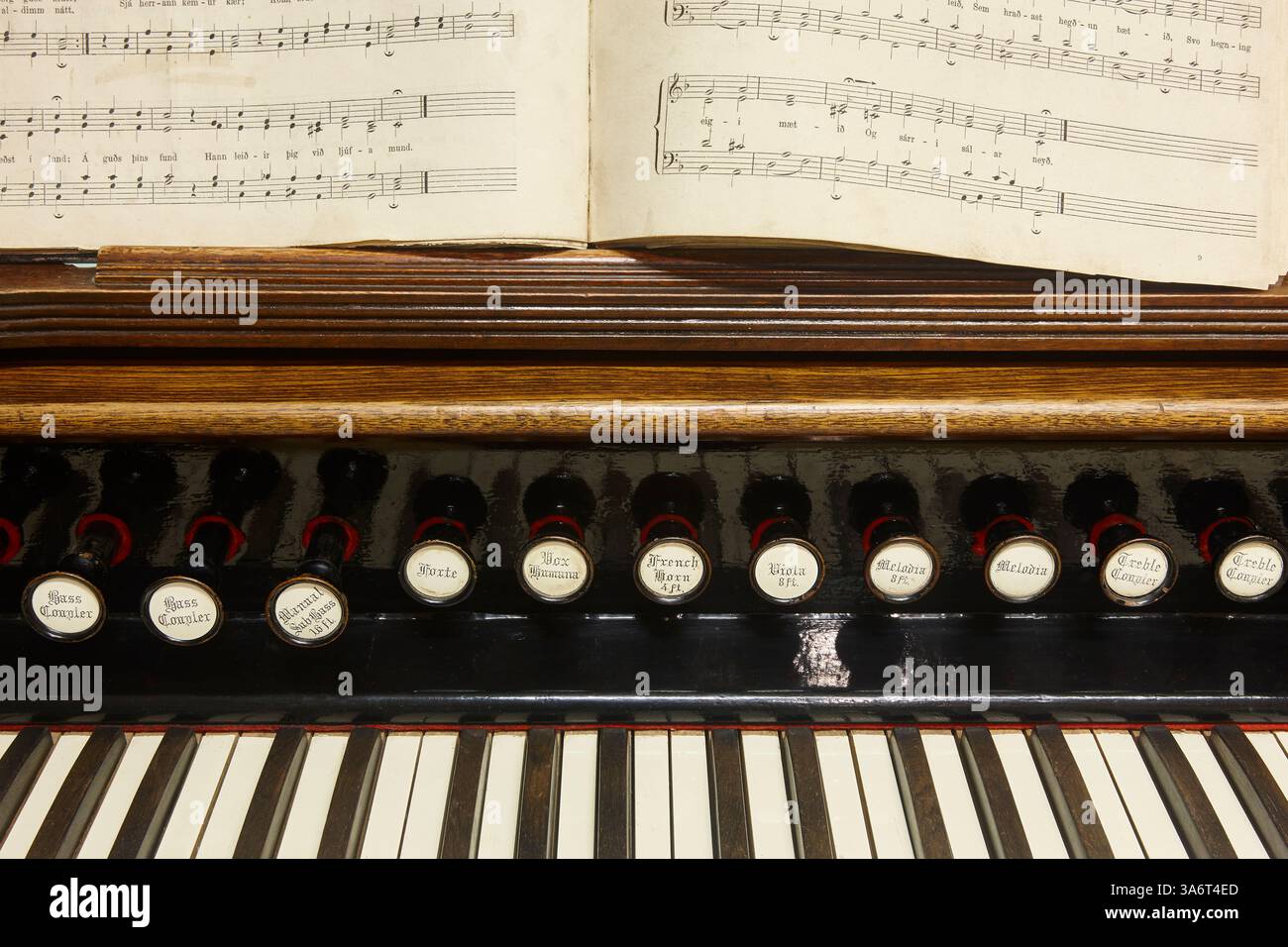 Traditional pipe organ and score in icelandic language Stock Photo - Alamy