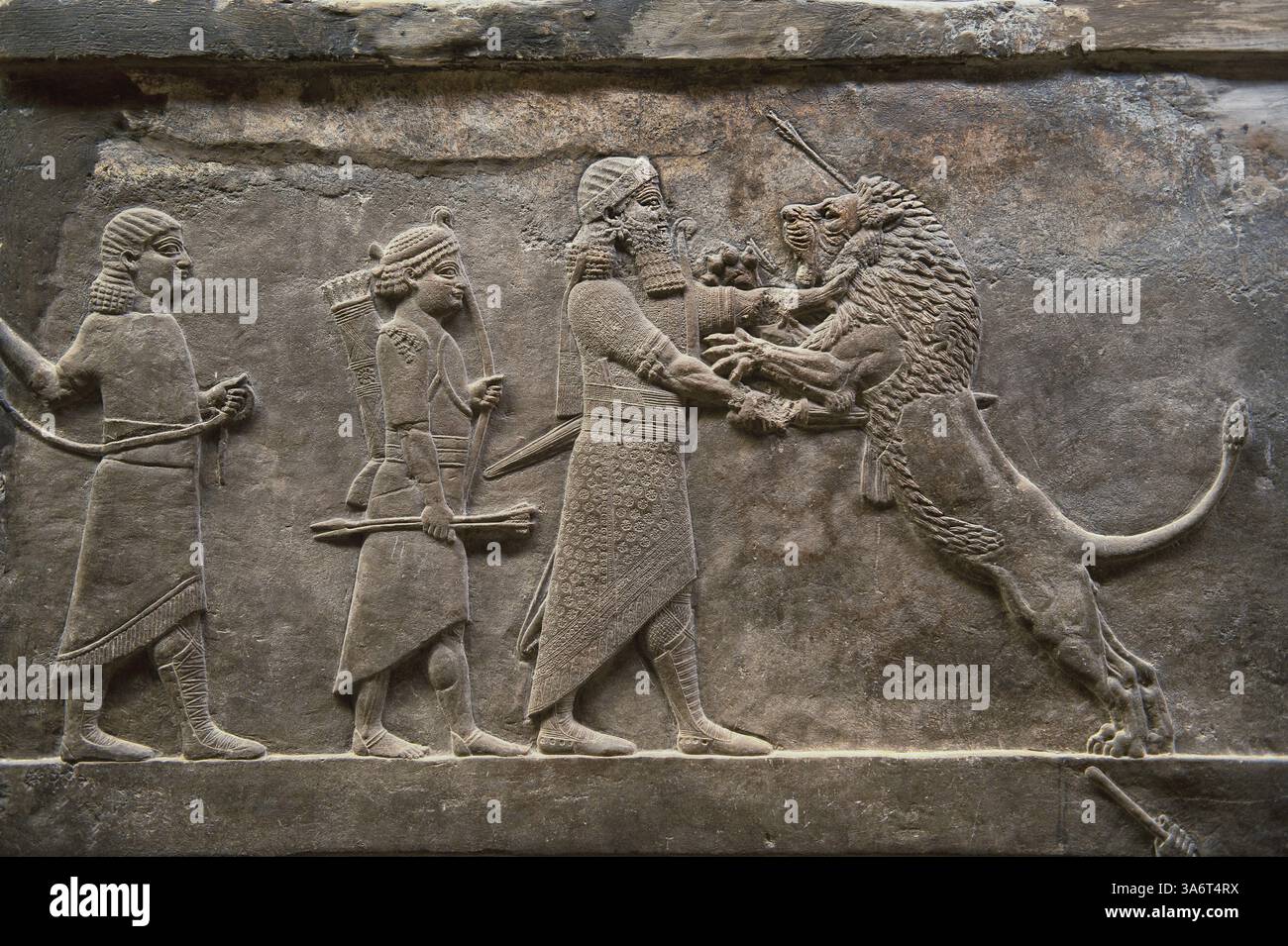 Assyrian bas relief sculpture panel depicting King Ashurnasirpal lion ...