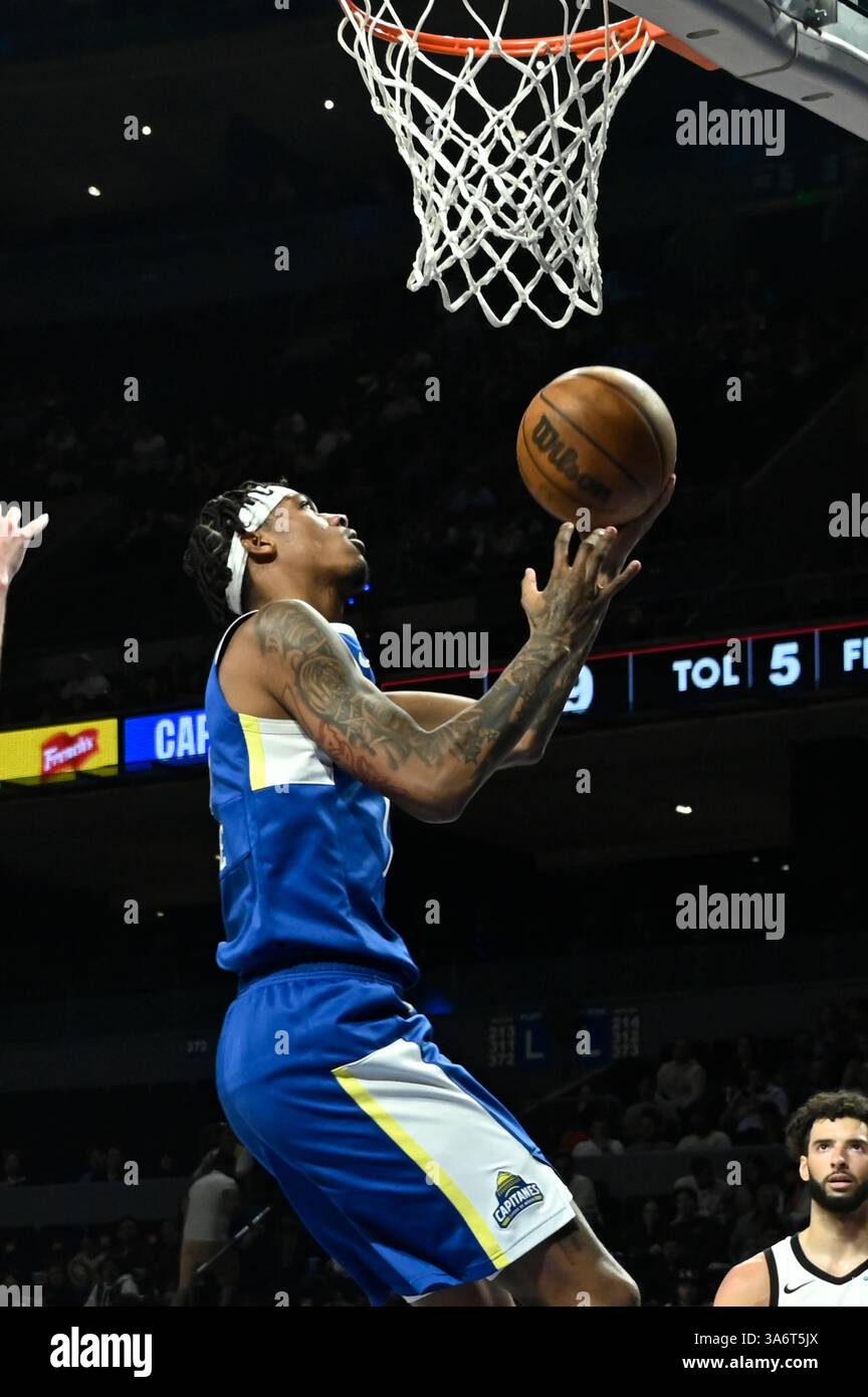 Capitanes Guard Dink Pate #1 drives to the basket during the NBA G ...