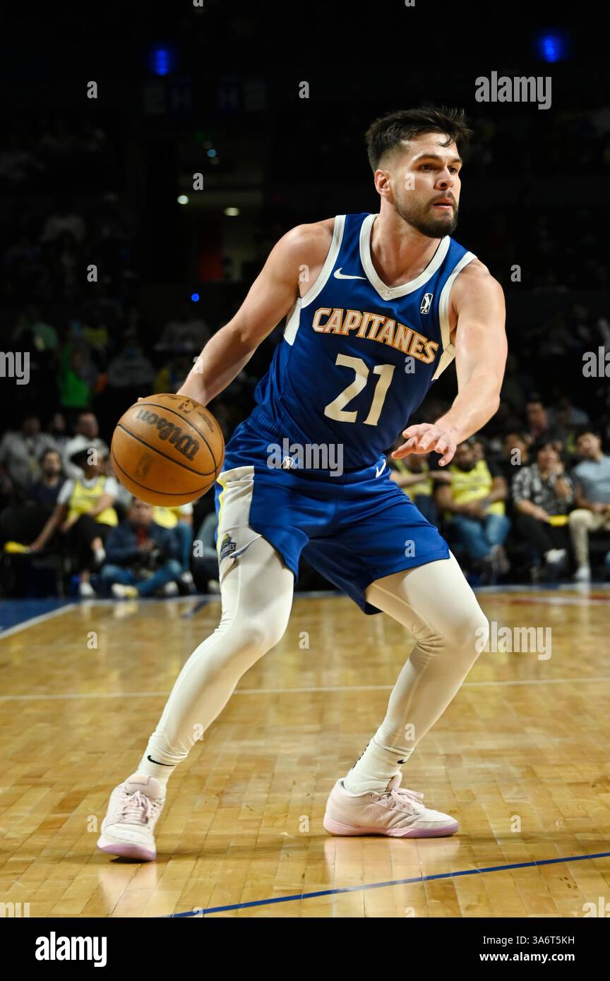 Capitanes guard Ivan Gandia-Rosa #21 drives to the basket during the ...