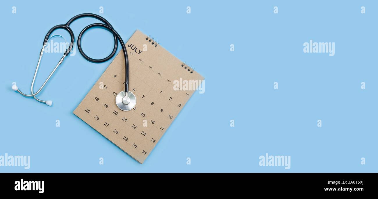Stethoscope with date on the calendar page on a blue background Health ...