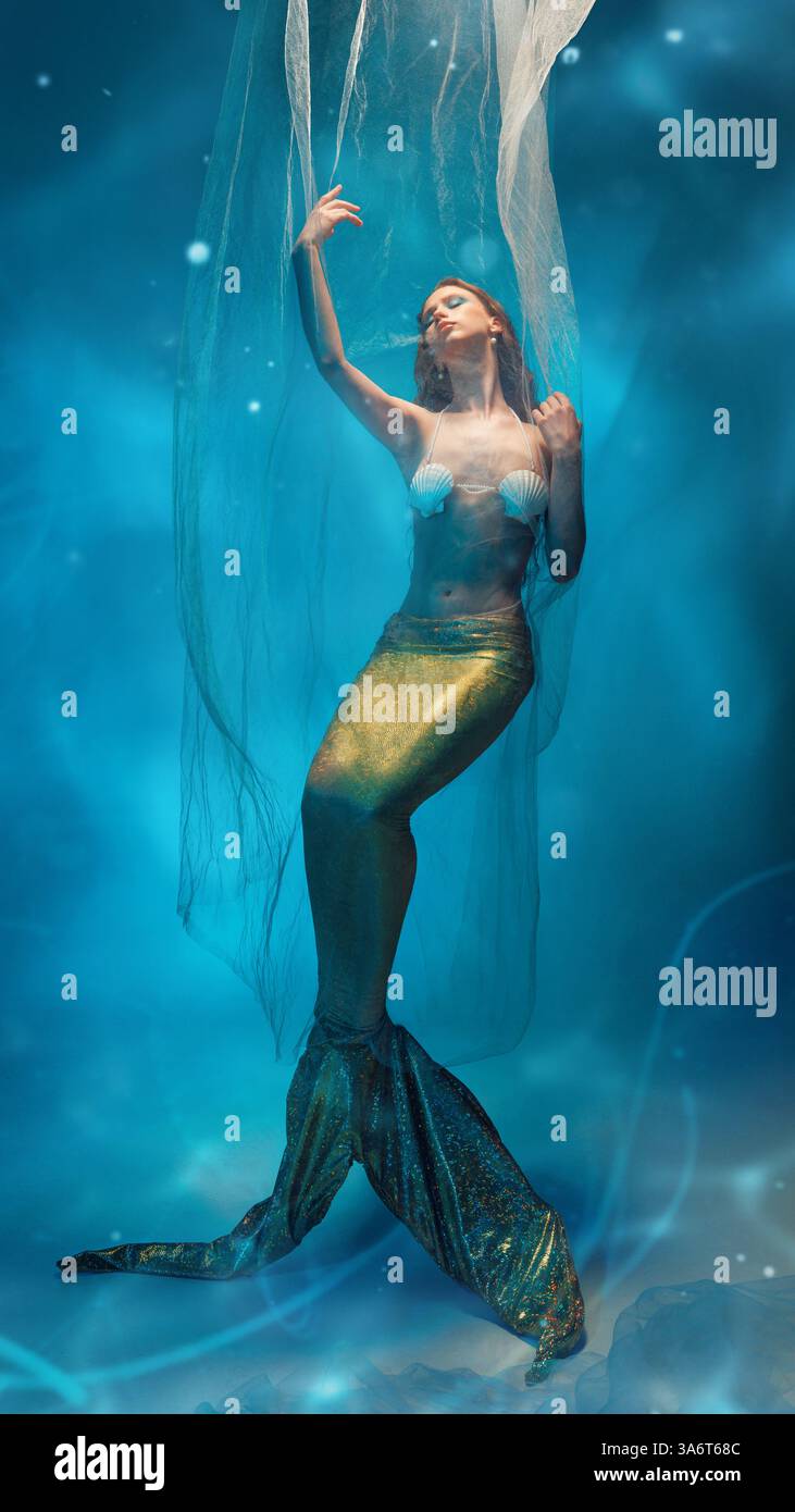 Mysterious light underwater beautiful young hi-res stock photography ...