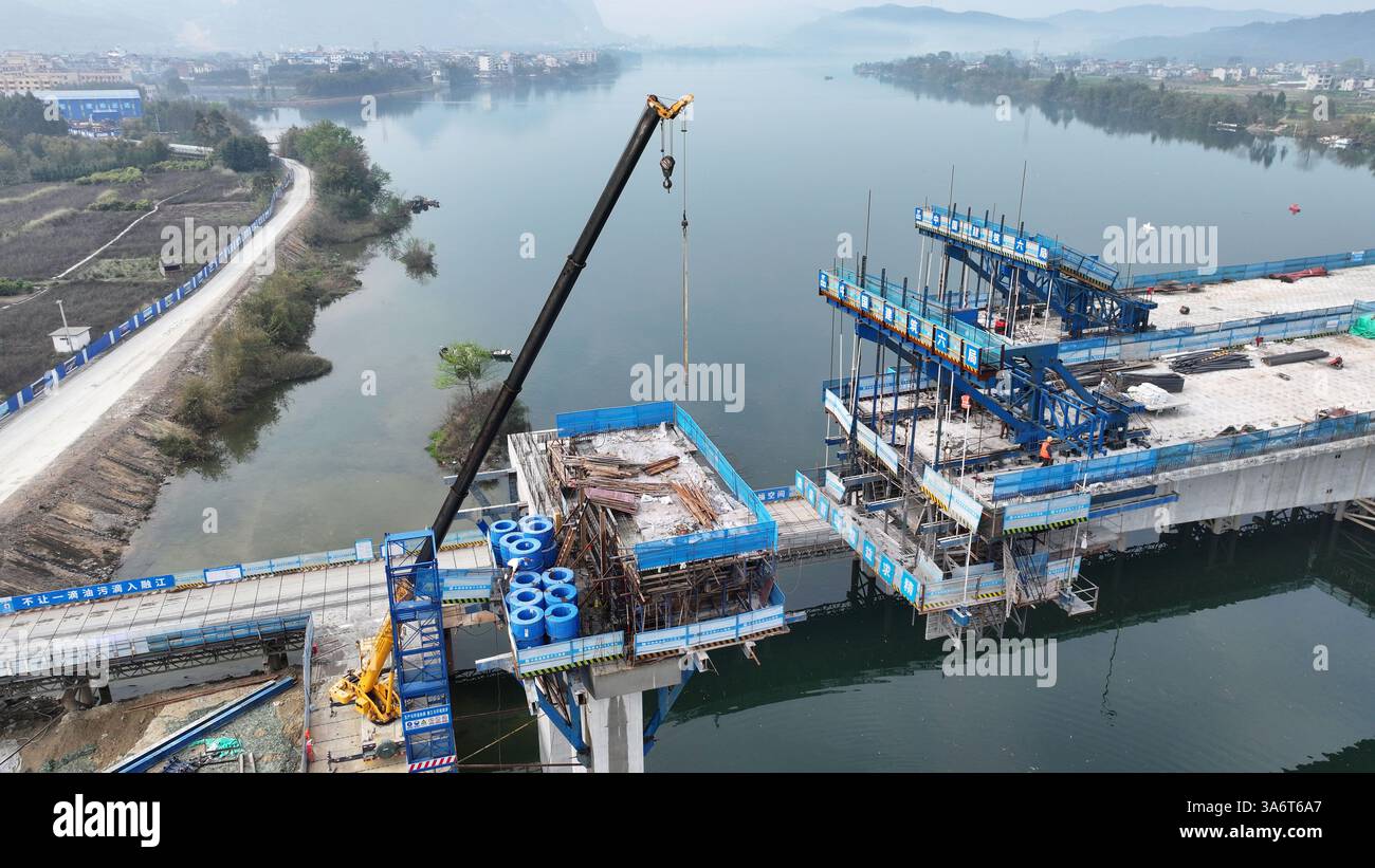 Workers are working at the construction site of Rongjiang Large Bridge ...