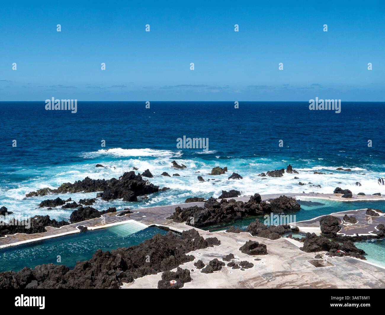 View of the natural swimming pools in Porto Moniz. Porto Moniz is a ...