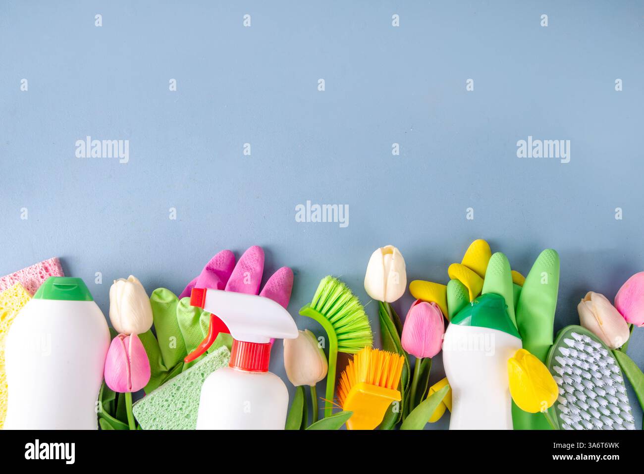 Colorful creative Spring cleaning background, with a bouquet with ...